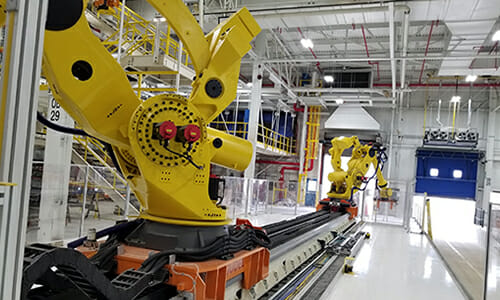 ASI was contracted to furnish and install automotive conveyor equipment ...